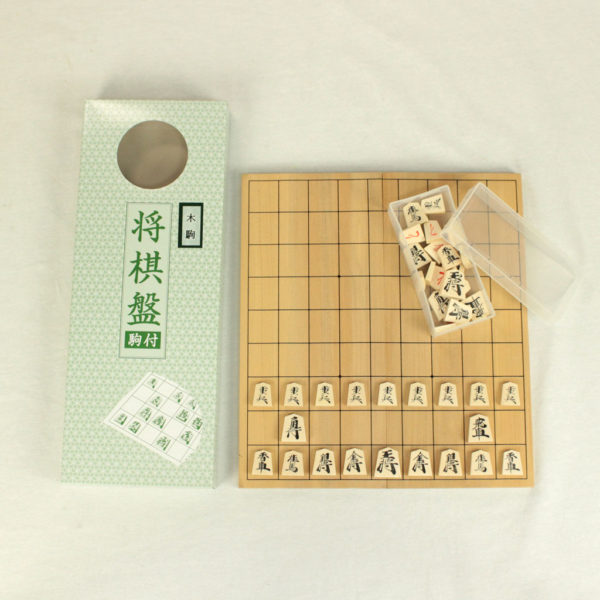Set of foldable Shogi board and wooden pieces